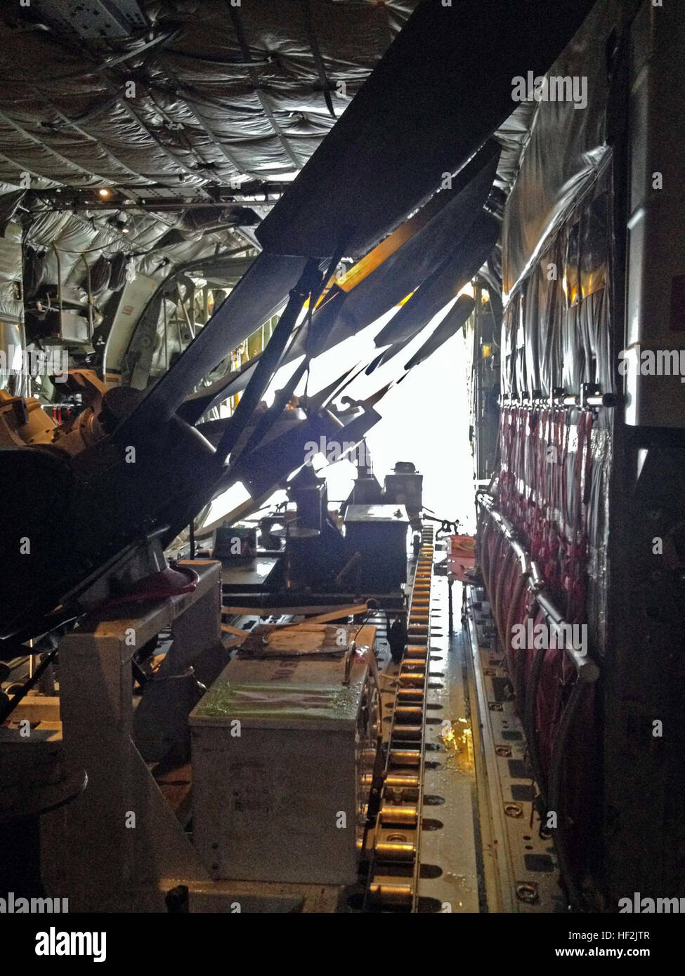 Three propellers are loaded into the cargo compartment of a KC-130J ...