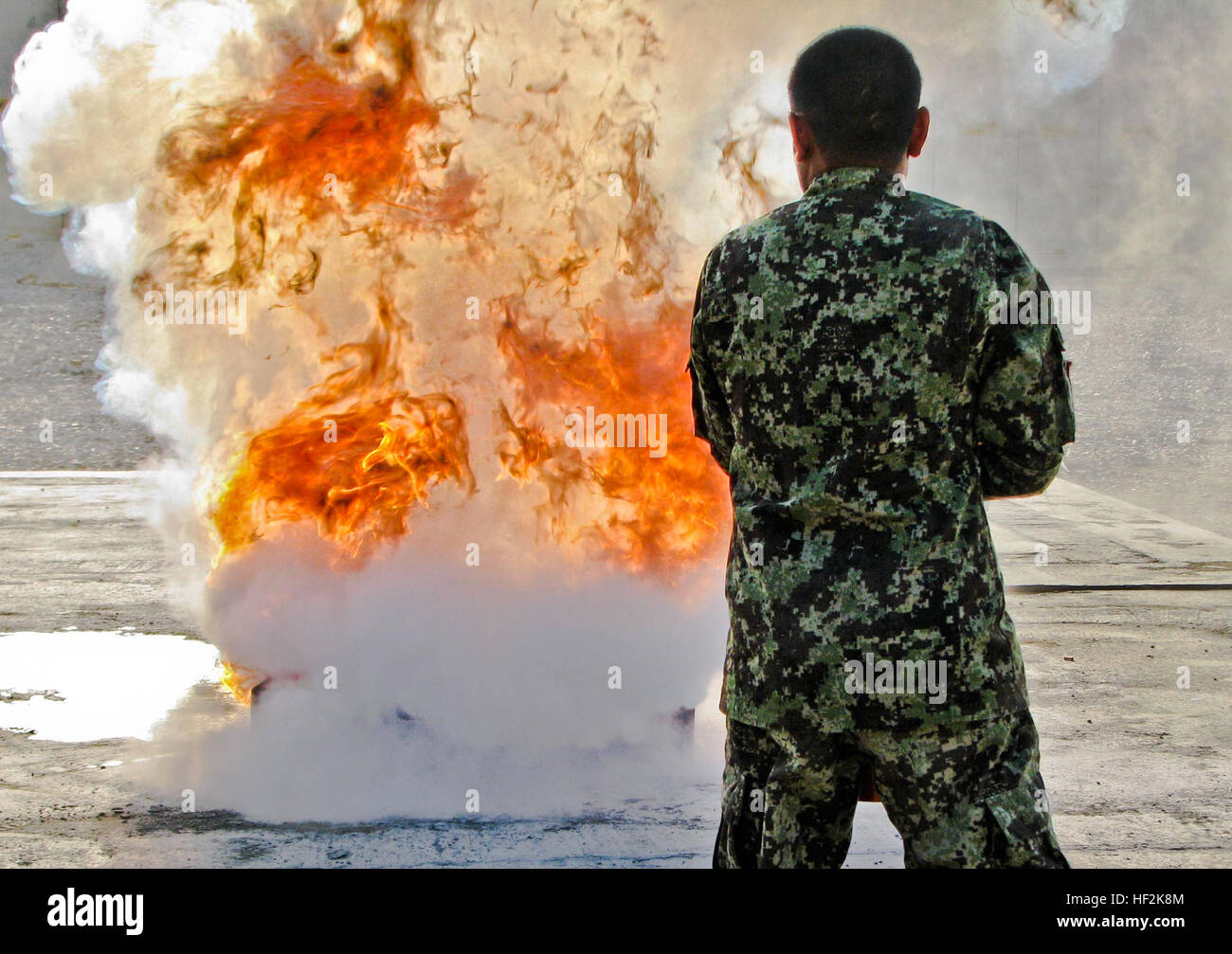 An Afghan soldier serving with the Military Police Guard Command ...