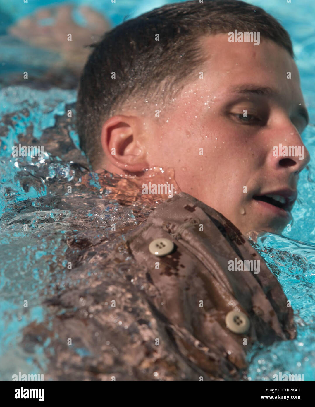 Sgt. Christopher Rateau-Holbach, from Fulton, Mississippi, swims laps ...