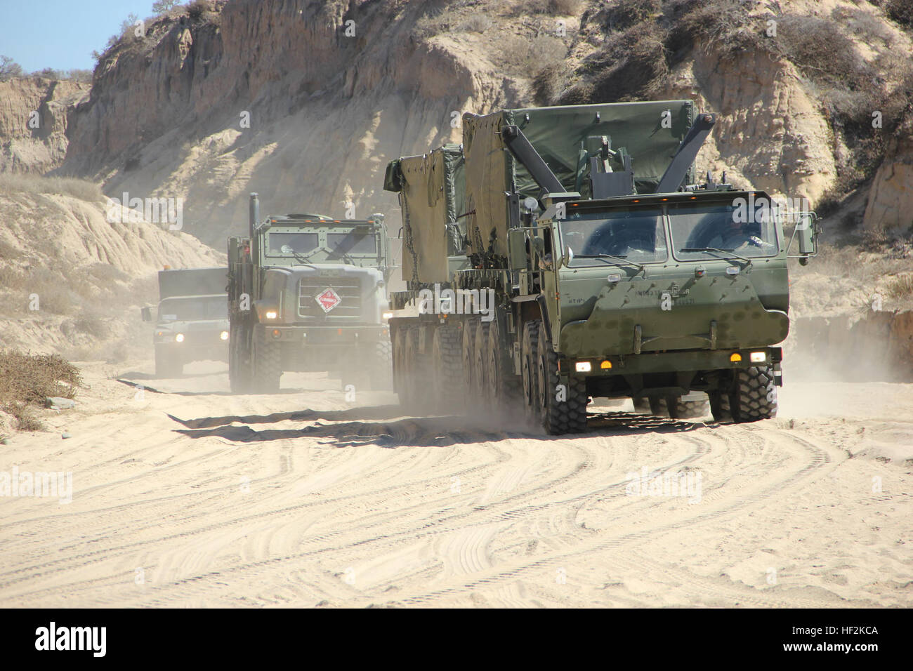 Marines with Marine Wing Support Squadron 373 transport components of ...