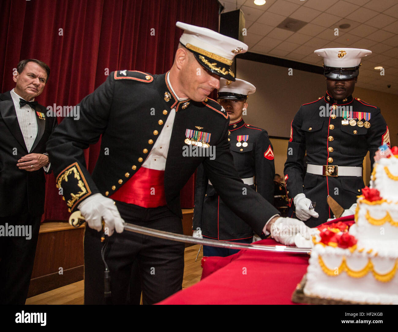 U.S. Marine Col. Vance L. Cryer cuts the birthday cake during the 15th ...