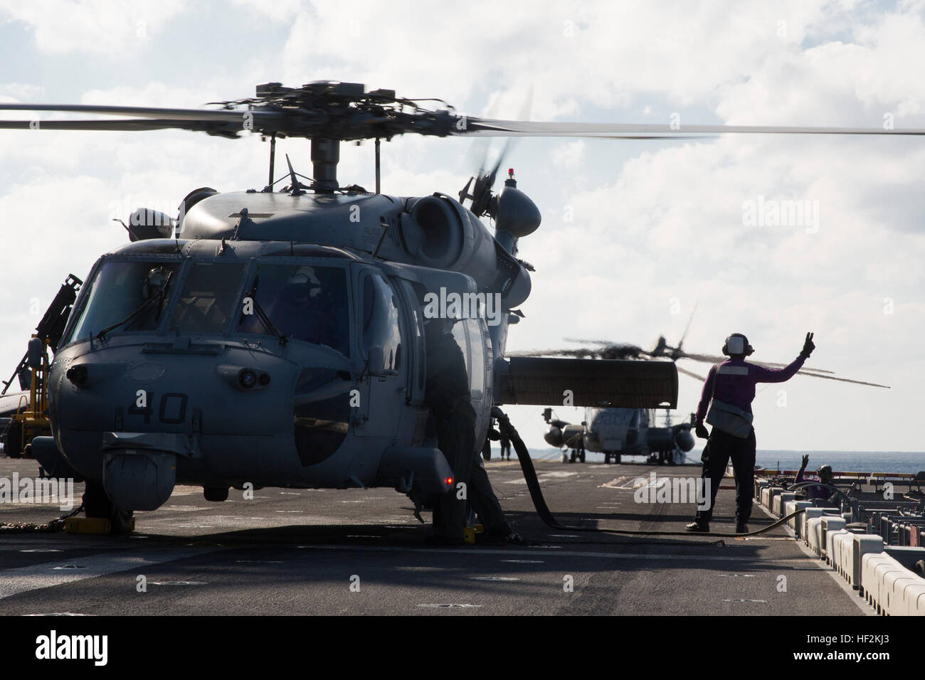 An aviation boatswain’s mate (fuel handler) with the Iwo Jima ...