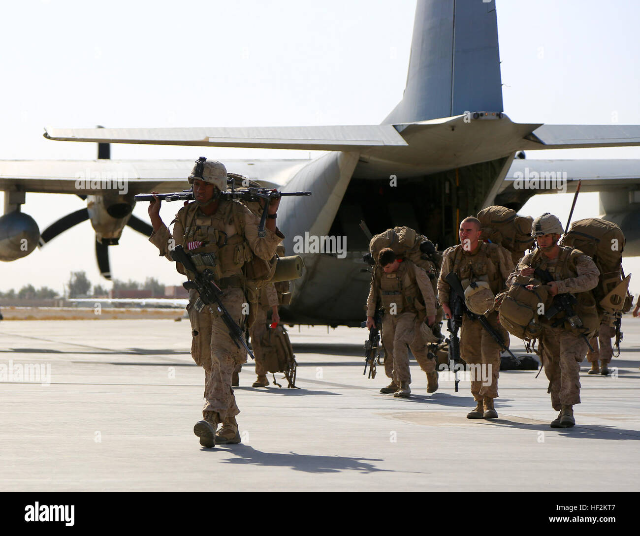 U.S. Marines with Regional Command (Southwest) (RC(SW)) exit a KC-130 ...
