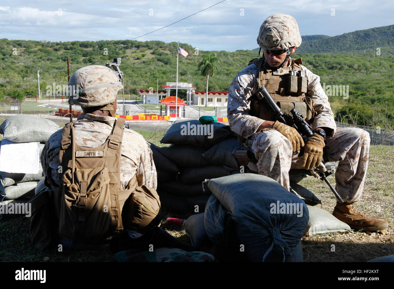 U.S. Marine Lance Cpl. Cameron Smith (left) and Sgt. Luis Cotts (right ...