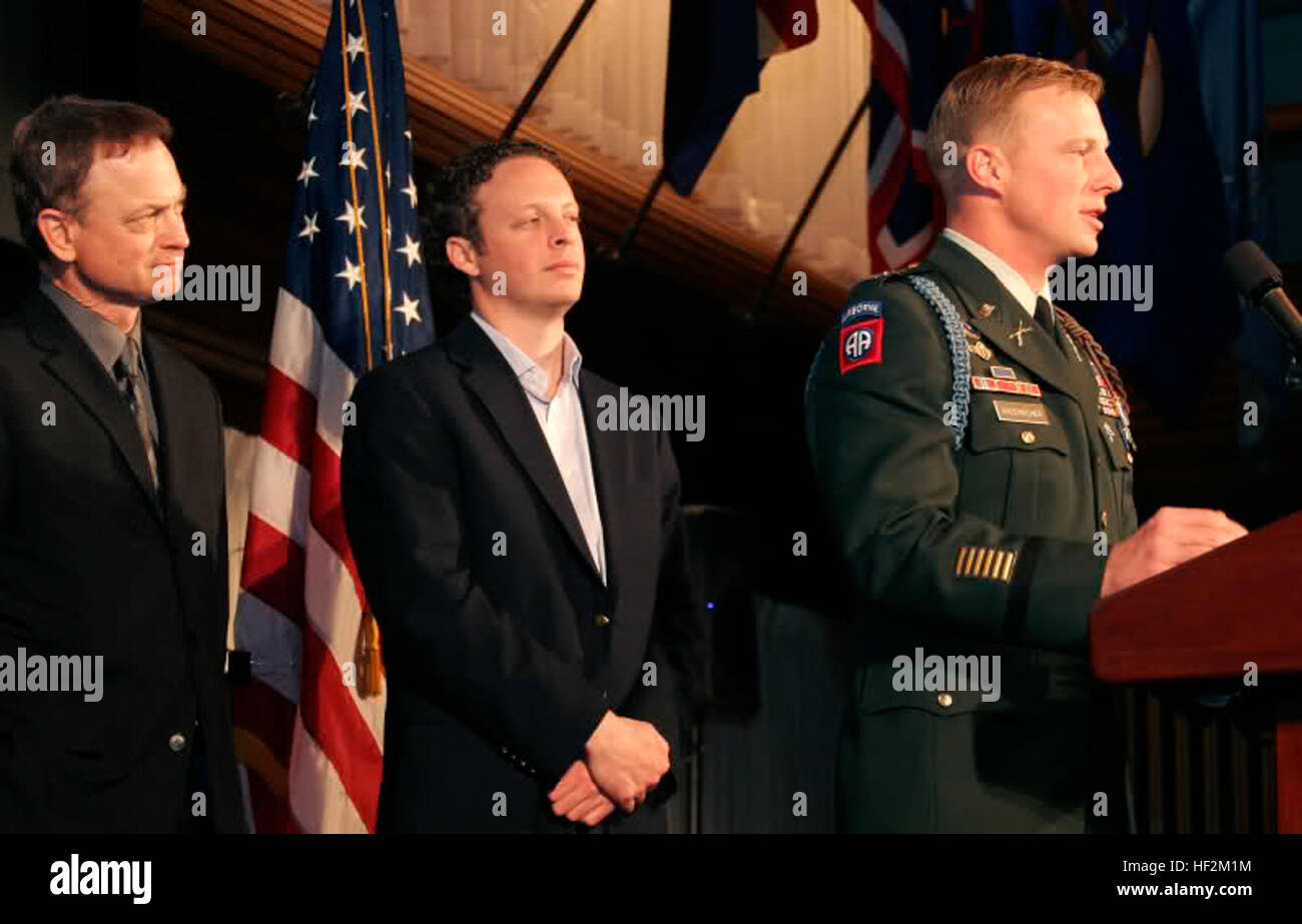 Army Capt. Isaac Rademacher answers a question while his brother Jake ...