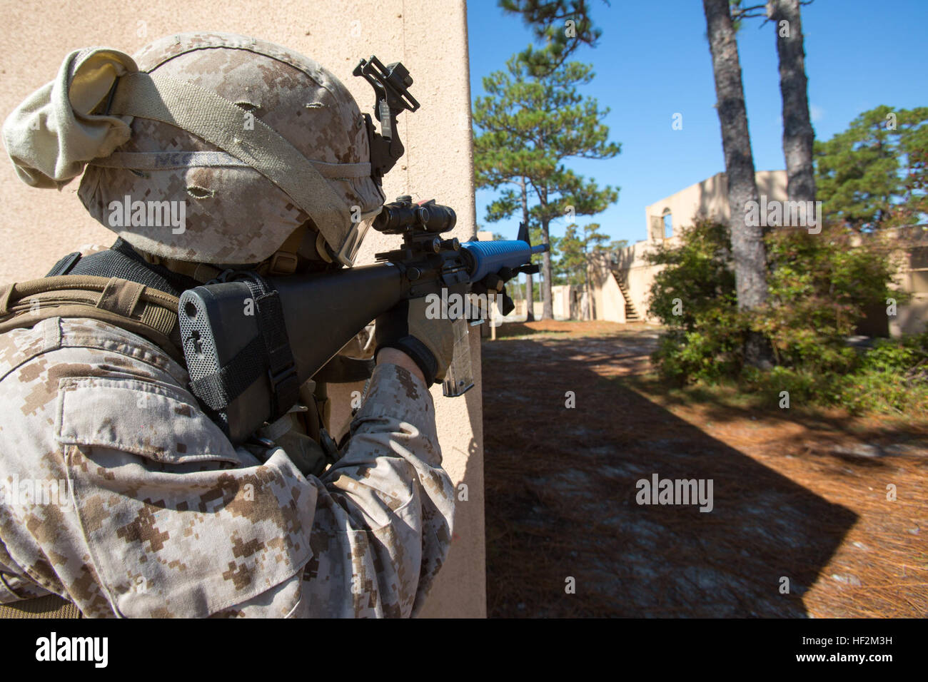 A Marine with 2nd Combat Engineer Battalion, 2nd Marine Division, peeks ...