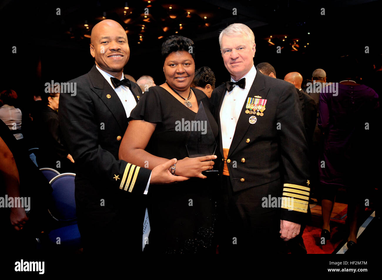 Cmdr. Roger Isom and wife, Lisa, pose for a photo with Chief of Naval ...