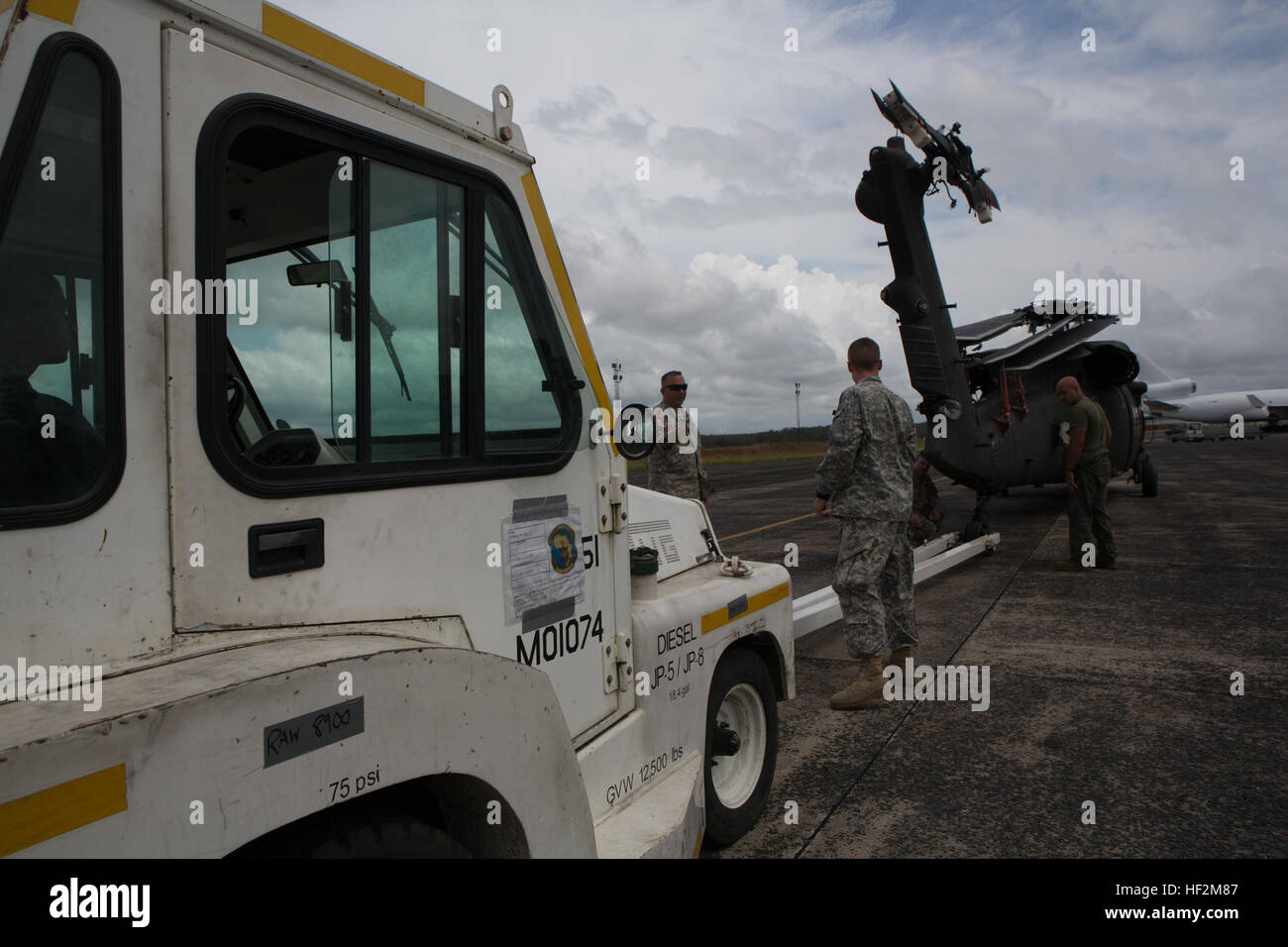 A U.S. Marine Corps Tug from SPMAGTF Crisis Response-Africa tows a U.S ...