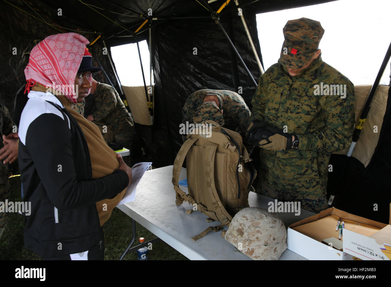 A Marine with Marine Wing Support Squadron 272 inspects the personal ...