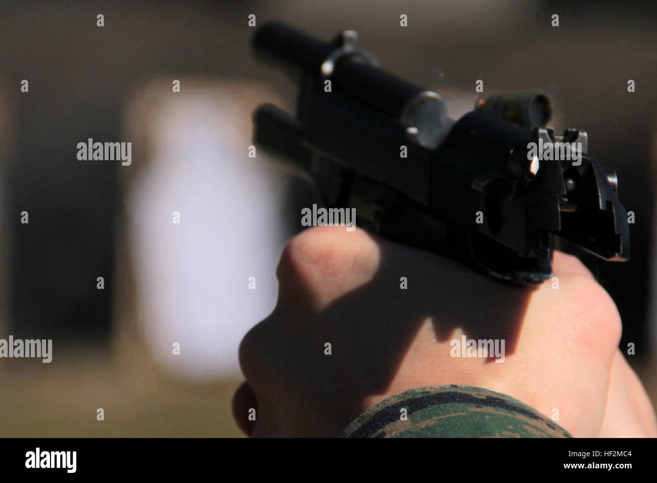 Marines conduct M9 pistol training at the Combat Pistol Program range ...