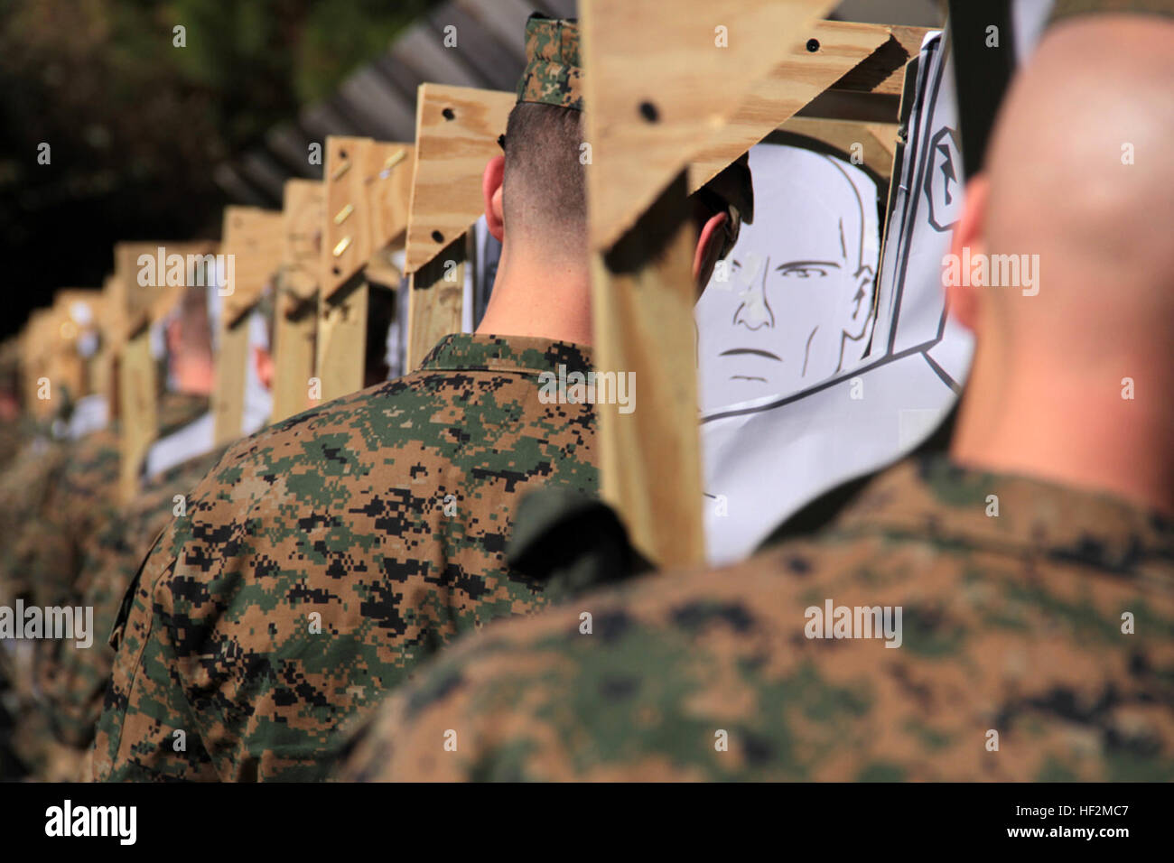 Marine Combat Pistol Program shooters paste shot holes after a course ...