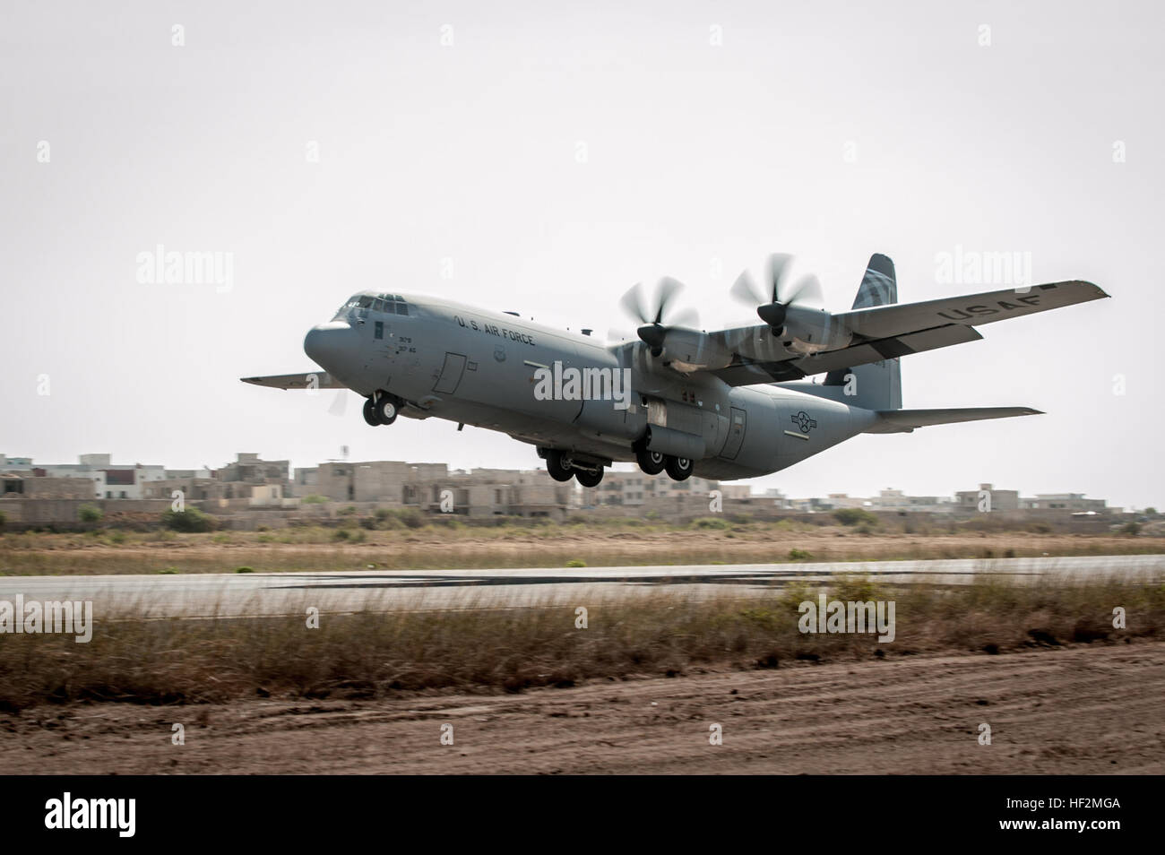 A U.S. Air Force C-130 Hercules departs from Dakar, Senegal, en route ...