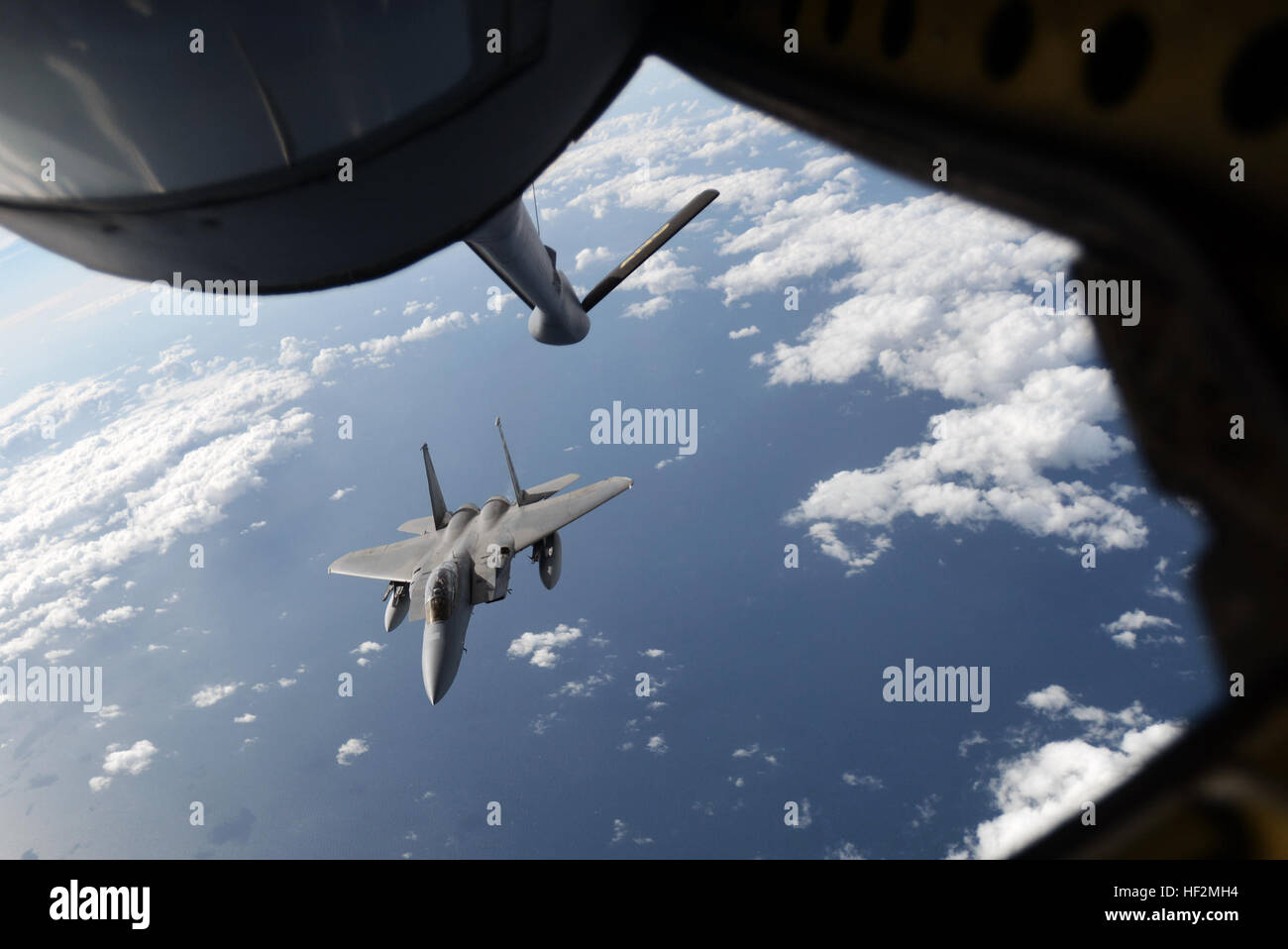 An 122nd Fighter Squadron F-15C refuels beneath a 171st Air Refueling ...