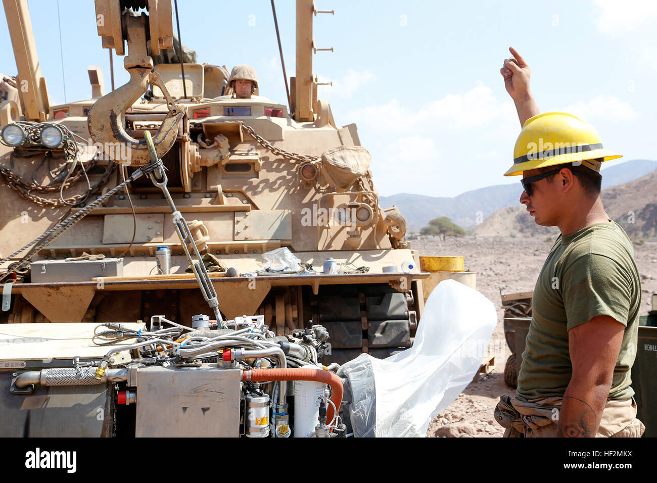 U.S. Marine Corps Sgt. Christian A. Madrid, right, an M1A1 main battle ...