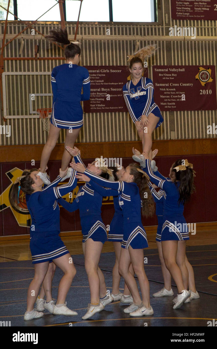 Members of Yokota High School’s cheer team perform during the 2014 Far ...