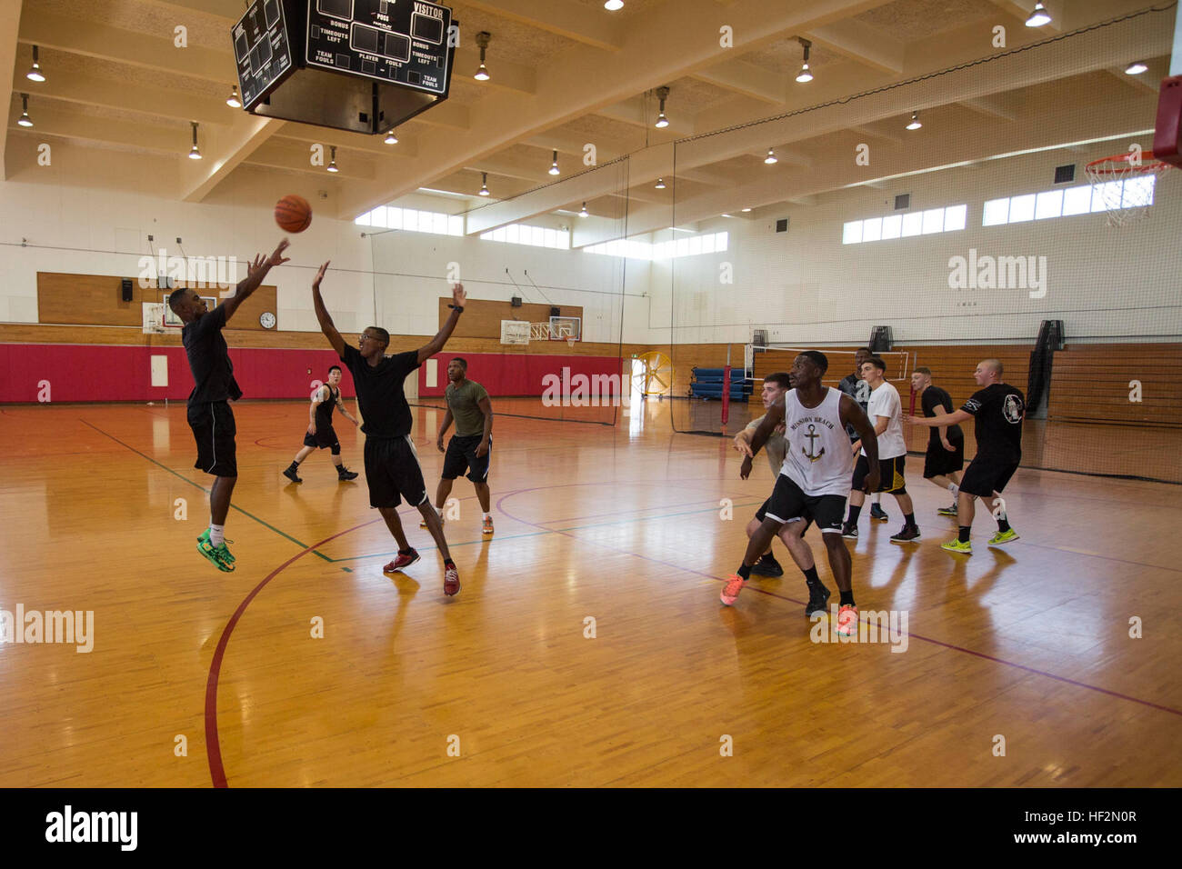 Marines compete in a basketball game here, Nov. 10. Following a Marine ...