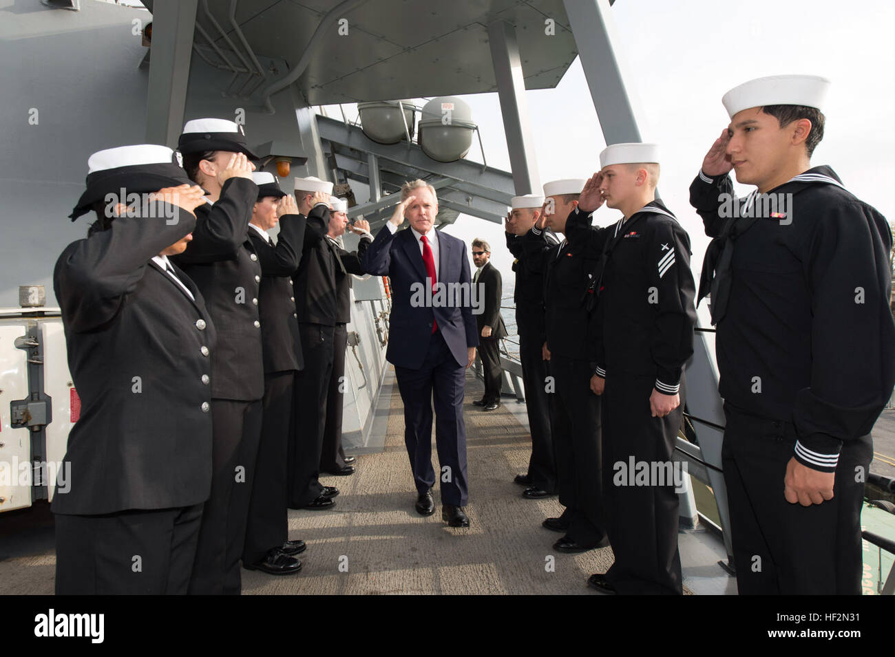 Sailors aboard USS Ross (DDG 71) pipe aboard the honorable Ray Mabus ...