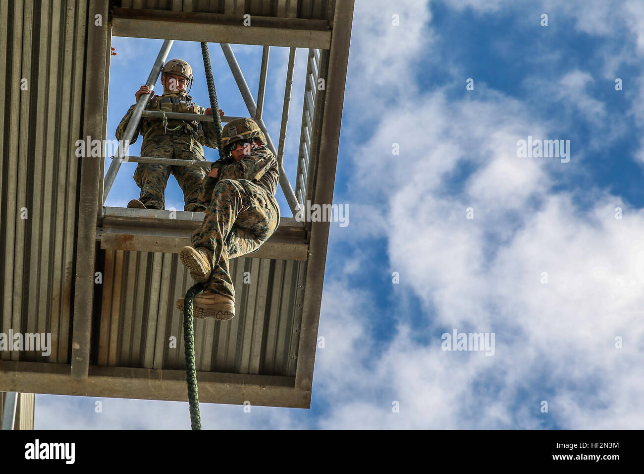 U.S. Marine Lance Cpl. Jake Vargas fast ropes during helicopter rope ...