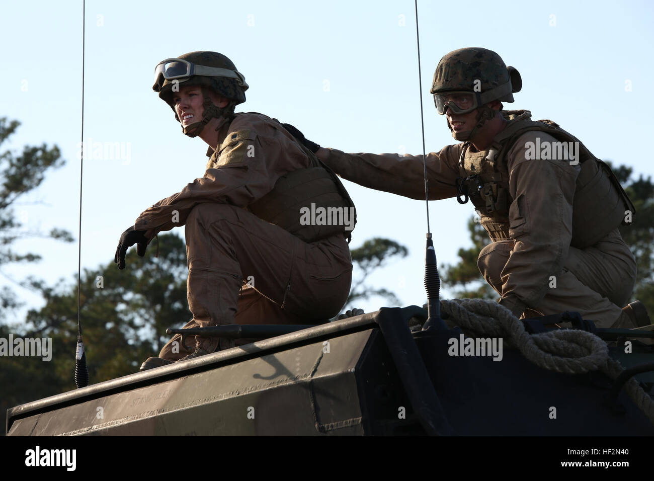 Lance Cpl. Kelsey Darling, left, amphibious assault vehicle crewman ...
