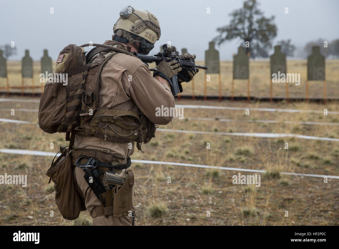 Marine Cpl. Jake Warden engages a target during Realistic Urban ...