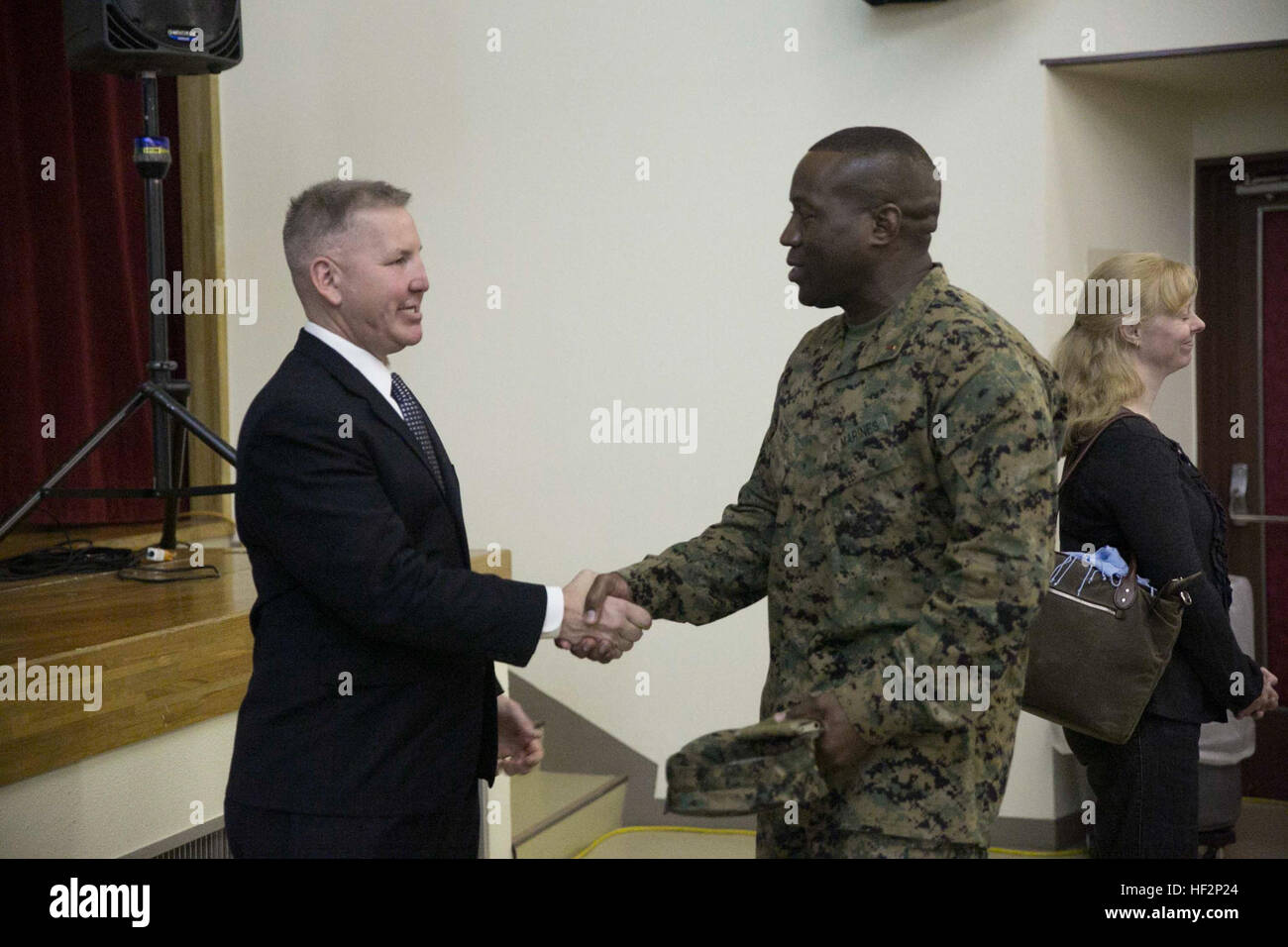 Justin Constantine, left, shakes hands with Chief Warrant Officer Edwin ...