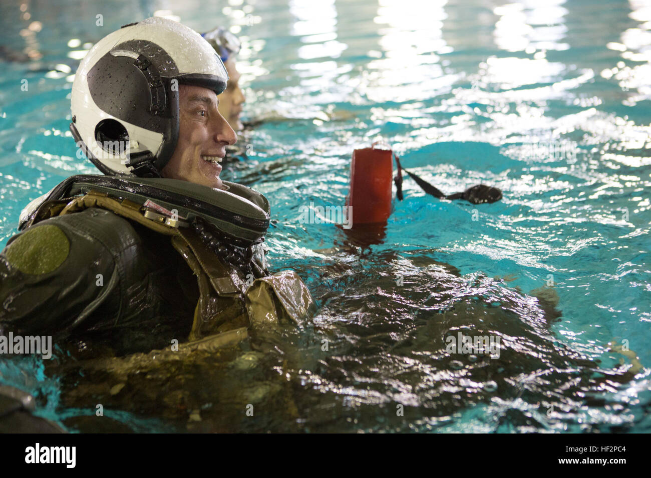 U.S. Navy HM2 Anthony J. Bartolini, an aeromedical safety corpsman ...