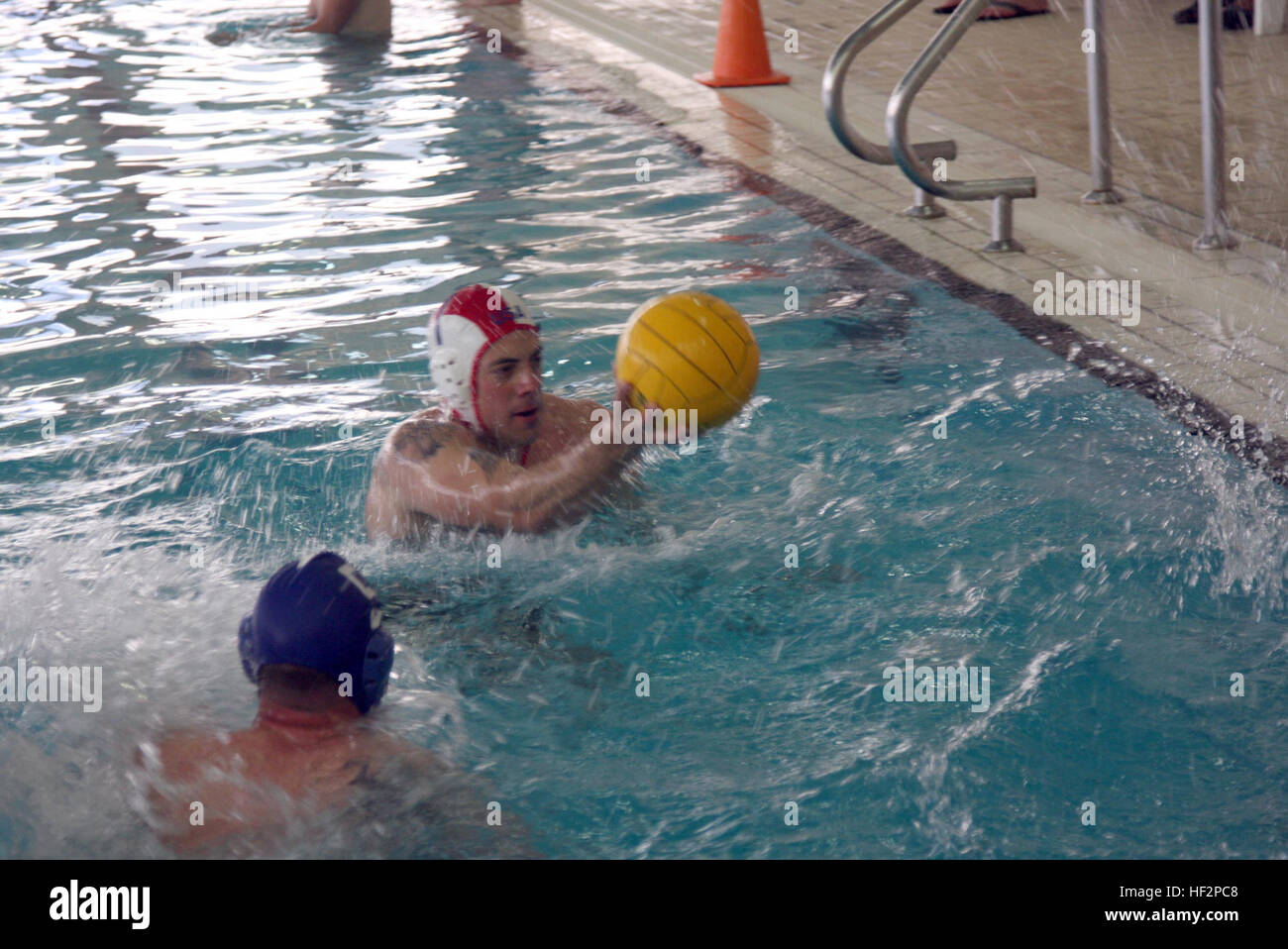 A Marine with 1st Reconnaissance Battalion prepares to throw a polo ...