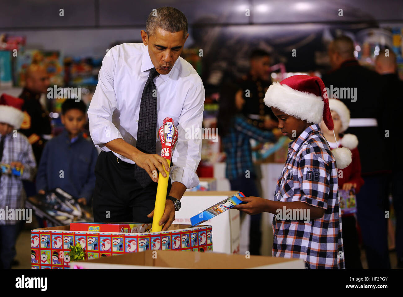 President Barack Obama whistles the tune "Rudolph the Red-Nosed ...