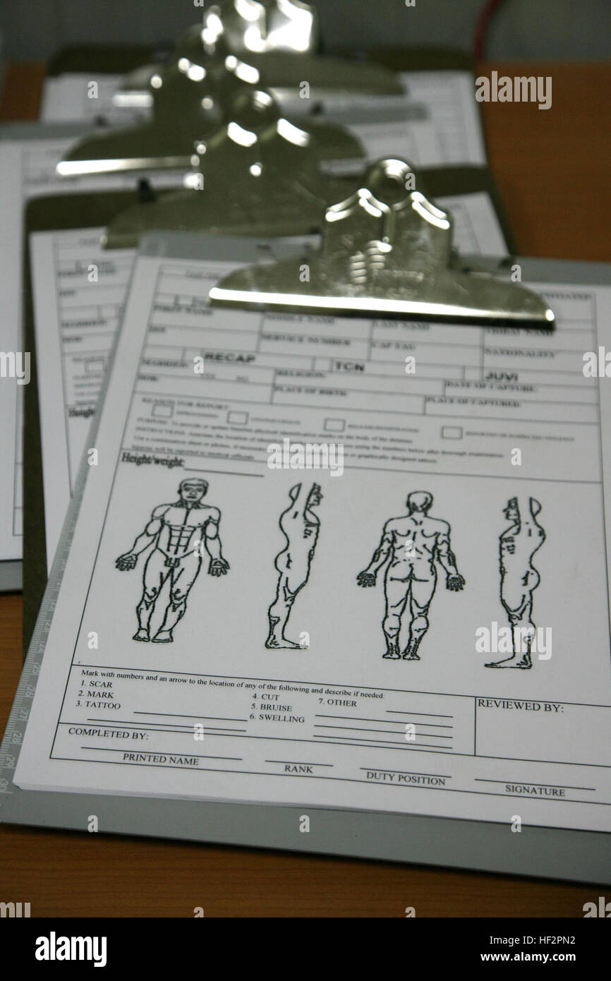 Medical forms are completed for each individual detainee to arrive in ...