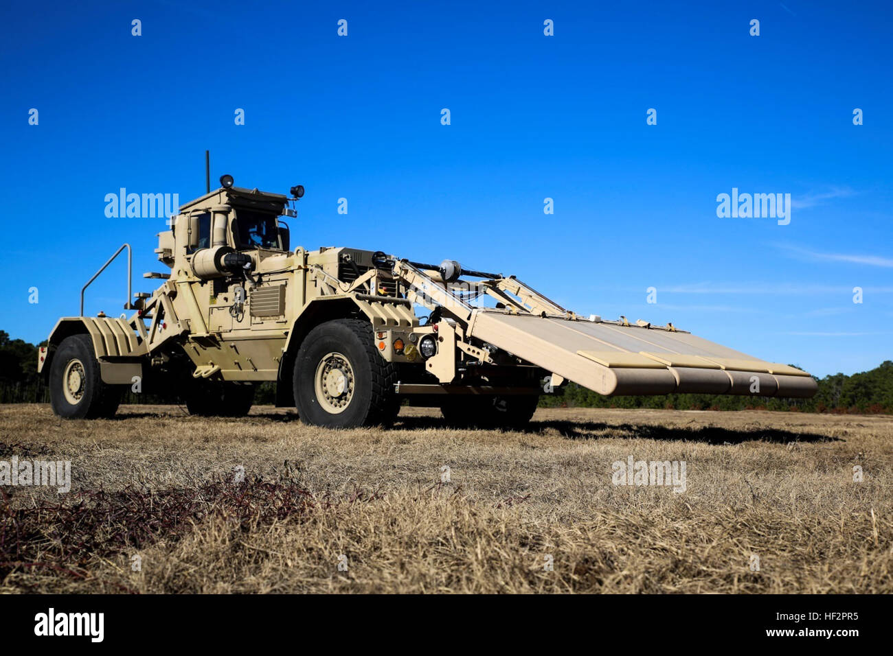 A Husky tactical support vehicle prepares to find simulated improvised ...