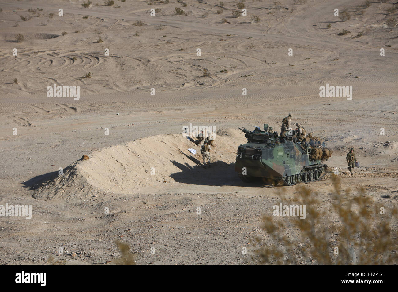 Marines with 1st Battalion, 4th Marine Regiment set up behind a berm ...