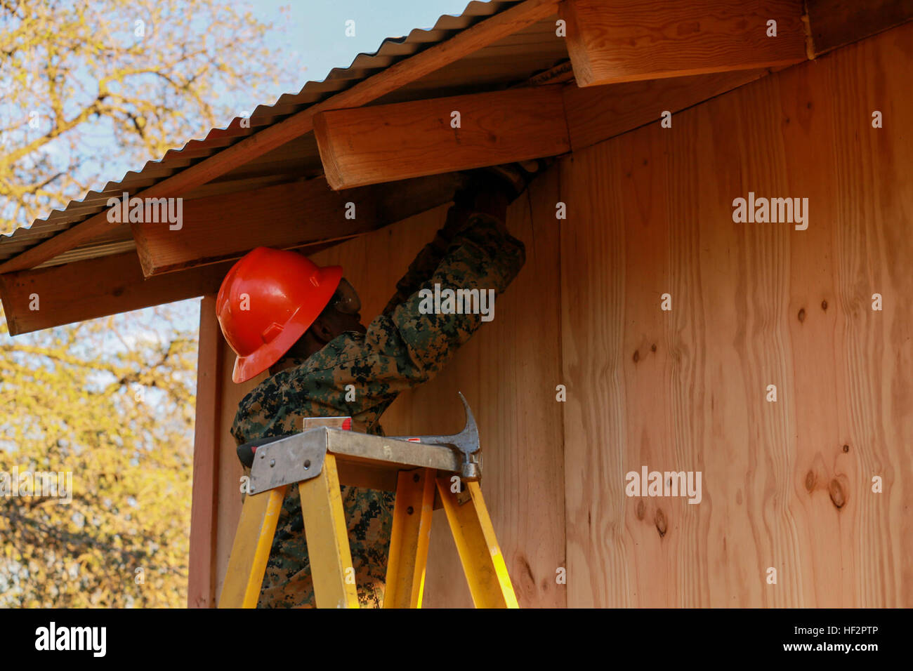 U.S. Marine Cpl. Shaquille Ross installs components of a Southwest Asia ...