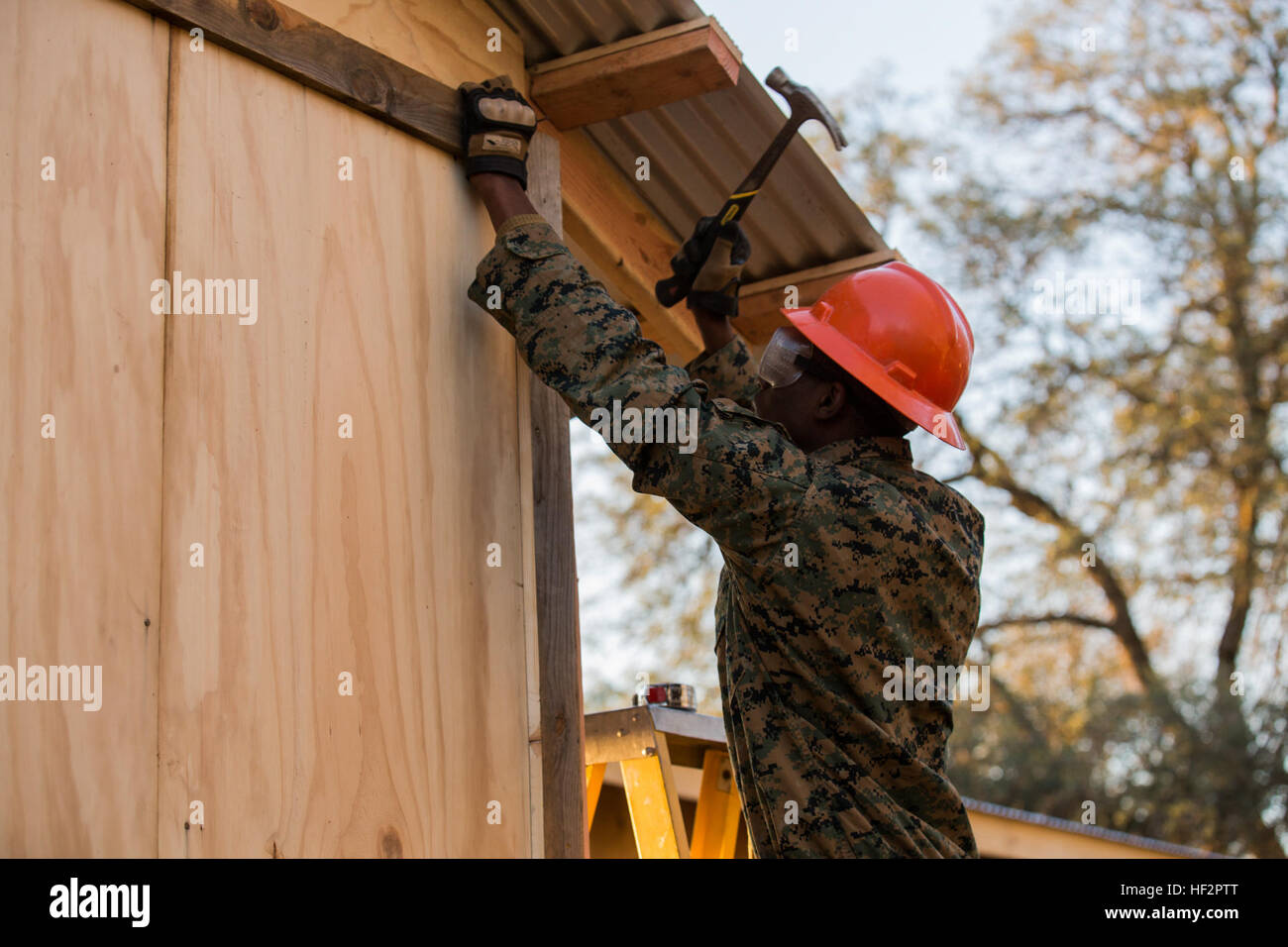 U.S. Marine Cpl. Shaquille Ross installs components of a Southwest Asia ...