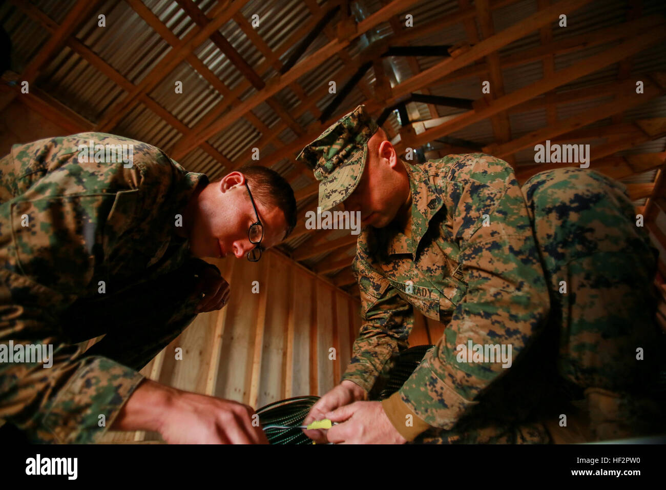 U.S. Marine Cpl. Michael Beck, left, and Sgt. Richard Contrady prepare ...