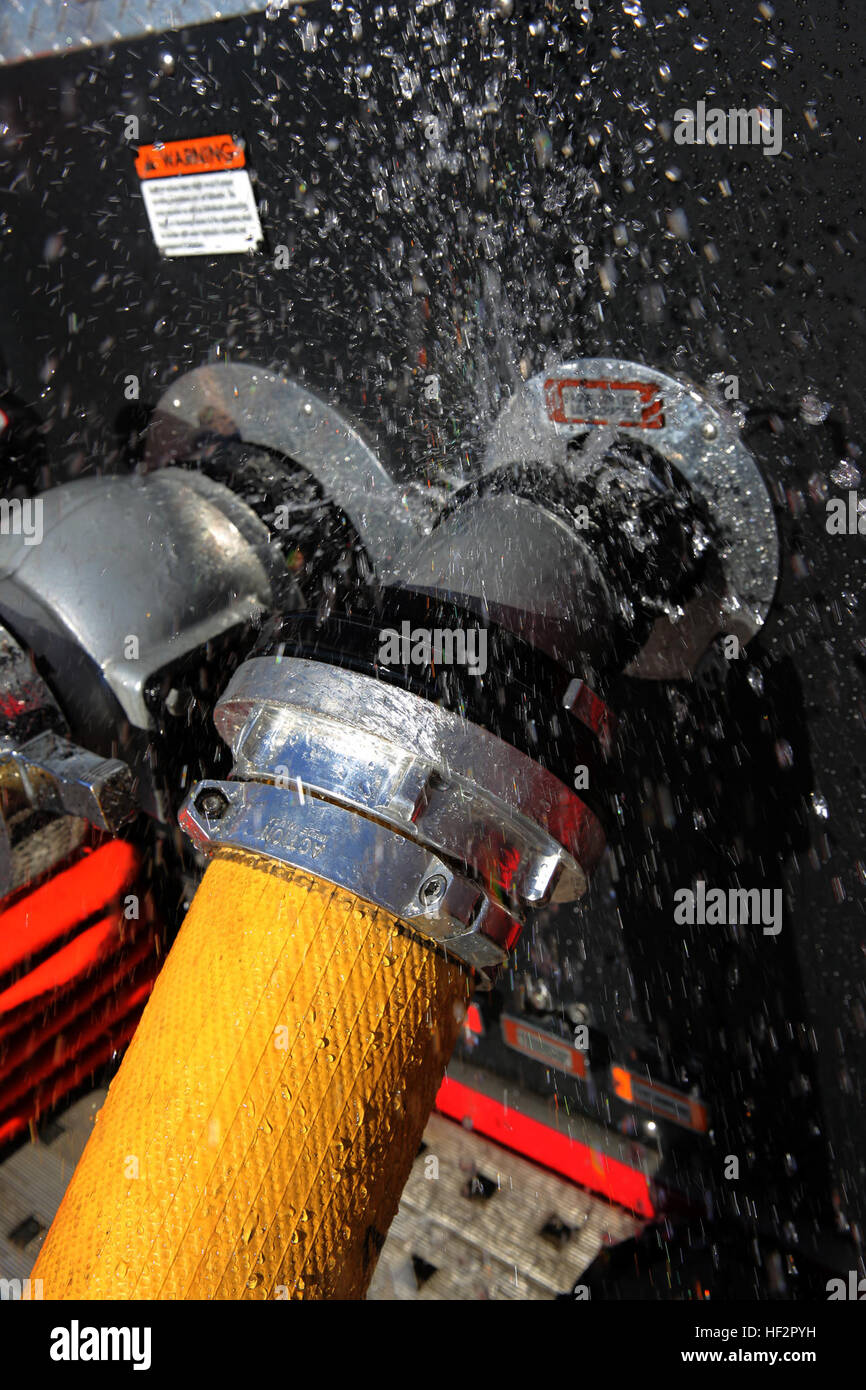 A fire engine pumps water during a fire relay drill at Marine Corps Air ...