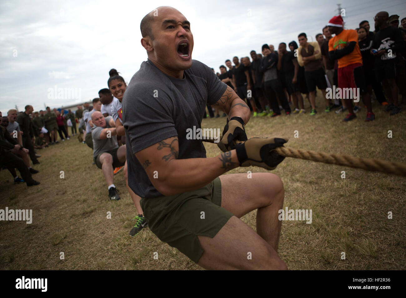 Master Chief Petty Officer Christopher Rebana screams cadence to unify ...