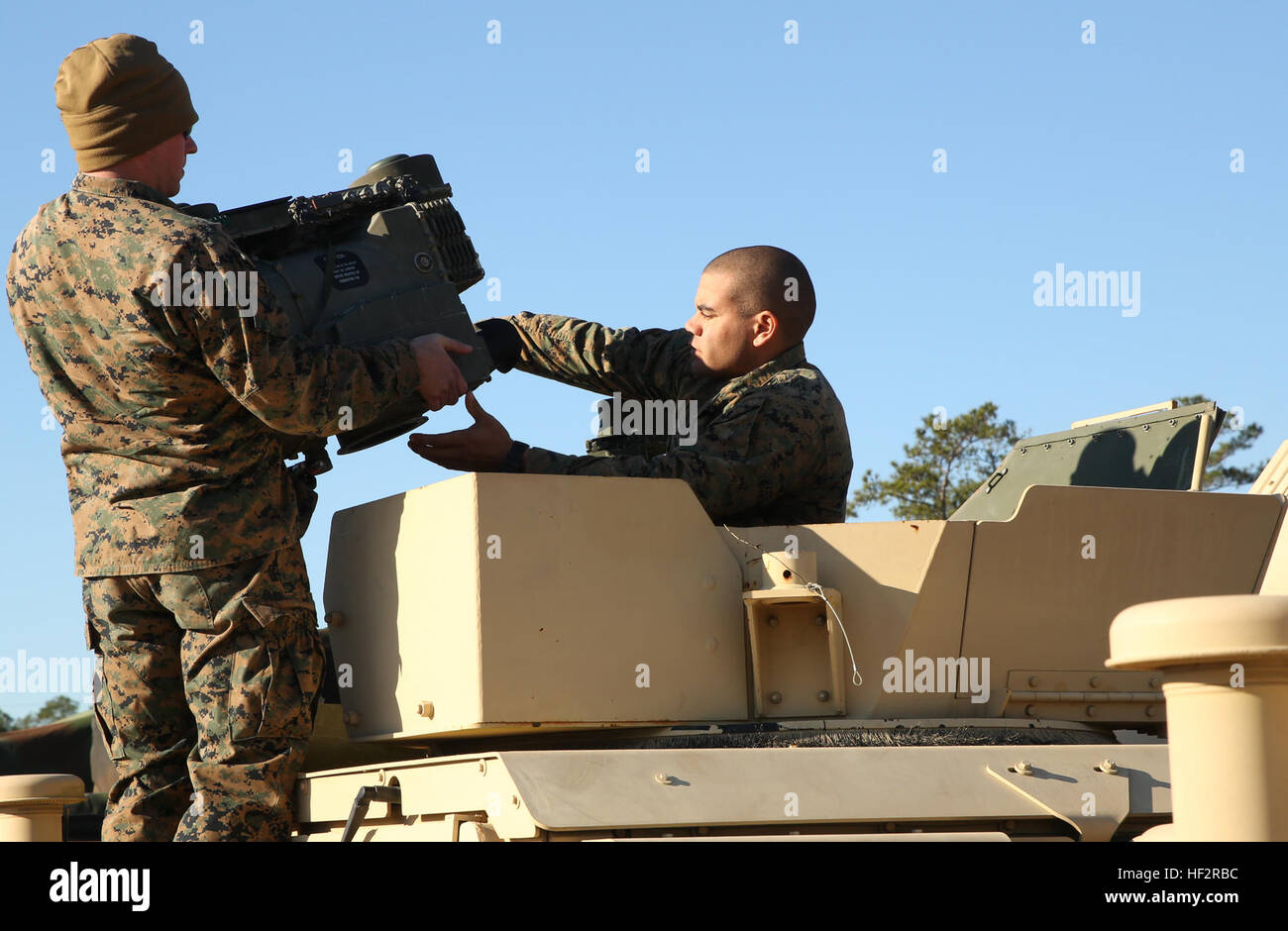 Lance Cpl. Karl A. Hill, left, and Sgt. Brandon T. Curtis, right, both ...