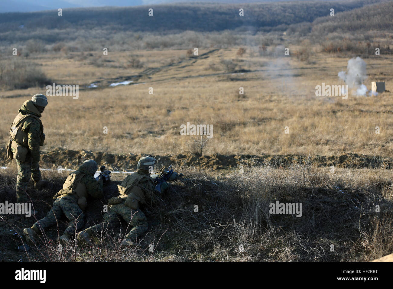 Two Black Sea Rotational Force Marines, firing 40mm high explosive ...