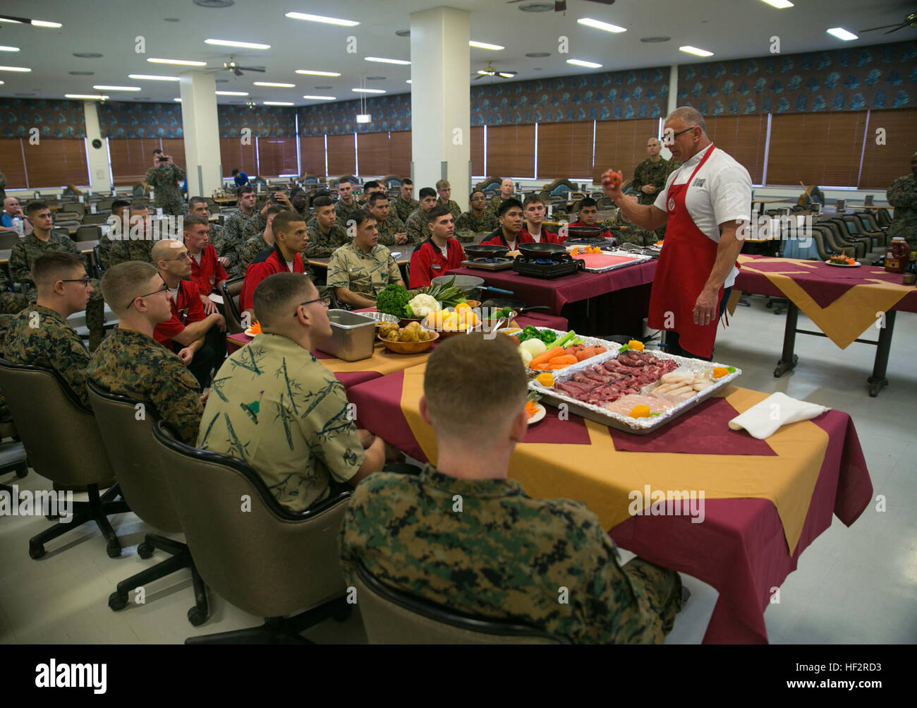 Chef Robert Irvine shows food service Marines with 4th Marine Regiment ...