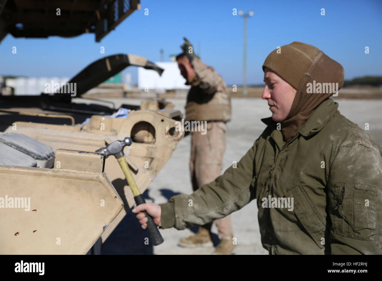 Sgt. Michelle A. Svec, tank crewman, and Cpl. Nick A. Buenviaje, tank ...