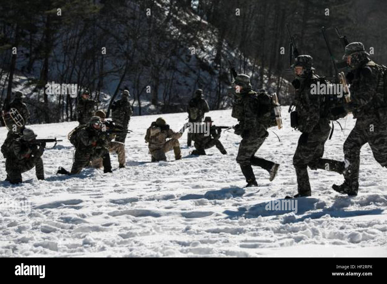 U.S. and Republic of Korea Marines practice firing while maneuvering ...