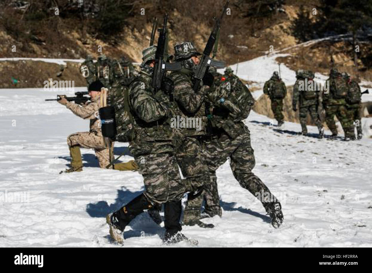 U.S. and Republic of Korea Marines practice firing while maneuvering ...