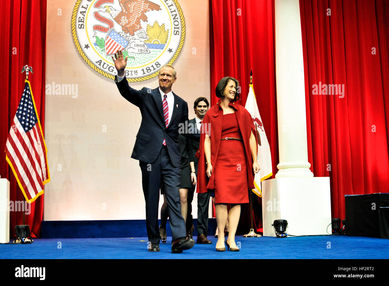 Bruce V. Rauner, governor-elect of Illinois, waves to the audience ...