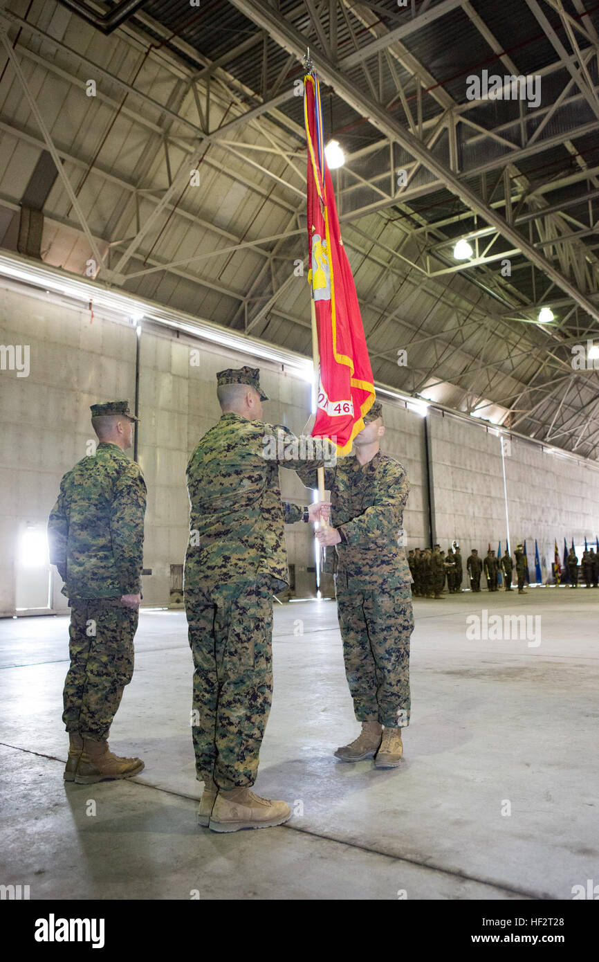 U.S. Marine Corps Lt. Col. Matthew R. Sale, middle, receives the ...