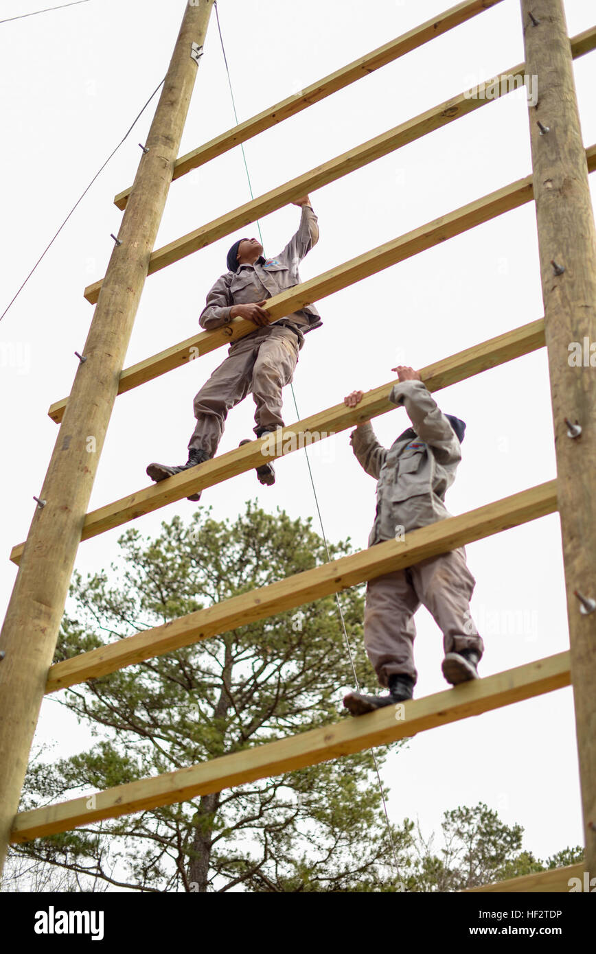 Tarheel Challenge Academy cadets climb a ladder at the obstacle course ...