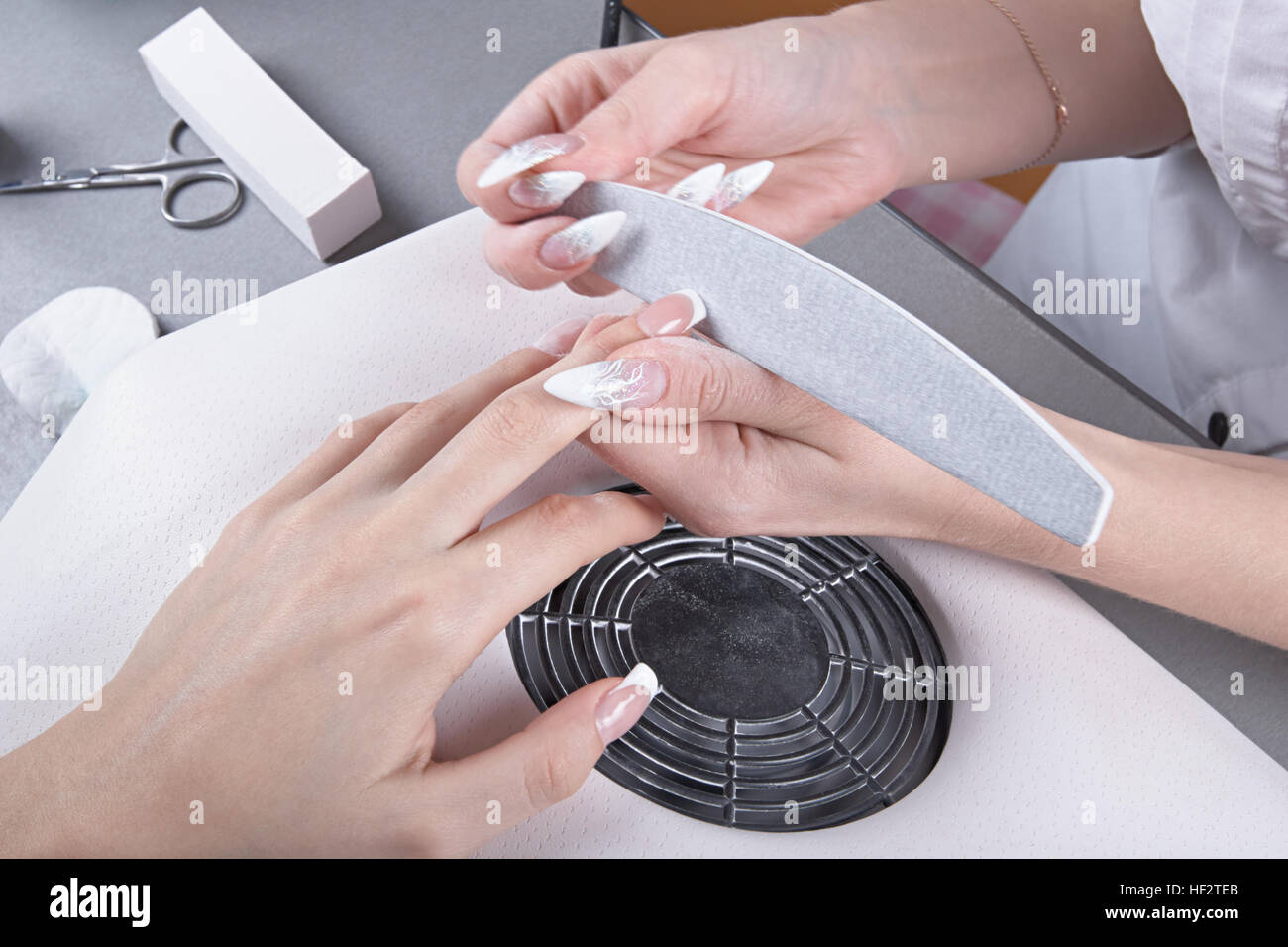 Extended finger nails hi-res stock photography and images - Alamy