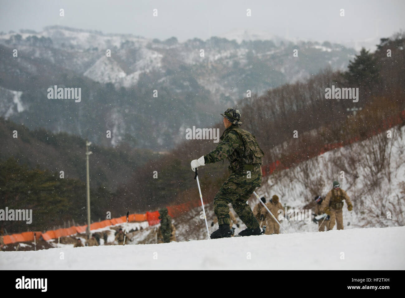 A Republic of Korea Marine practices turning during snow mobility ...