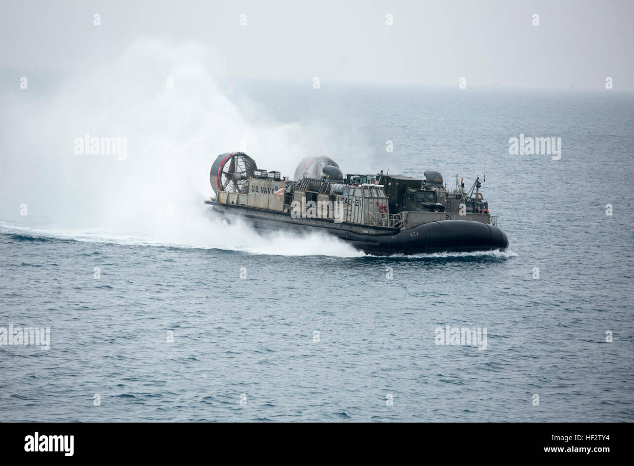 A U.S. Navy Landing Craft Air Cushion transports equipment from White ...