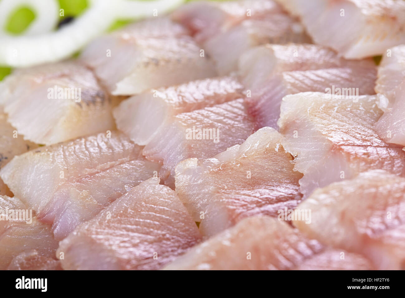 Fillet of a lightly salted grayling closeup Stock Photo - Alamy