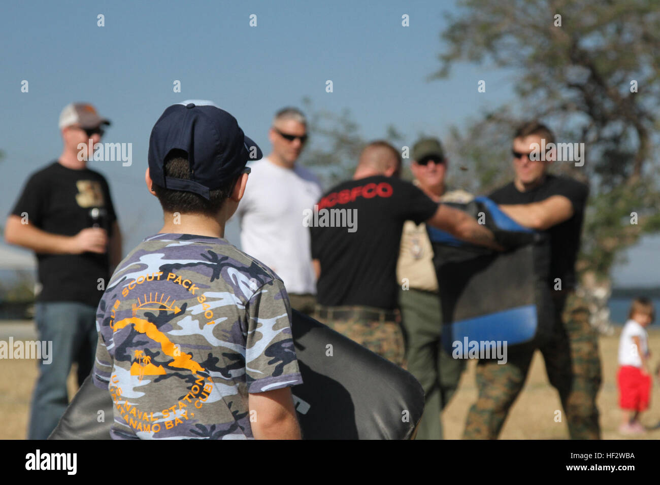 A Cub Scout with Cub Scout Pack 3401 at Guantanamo Bay, Cuba stand ...